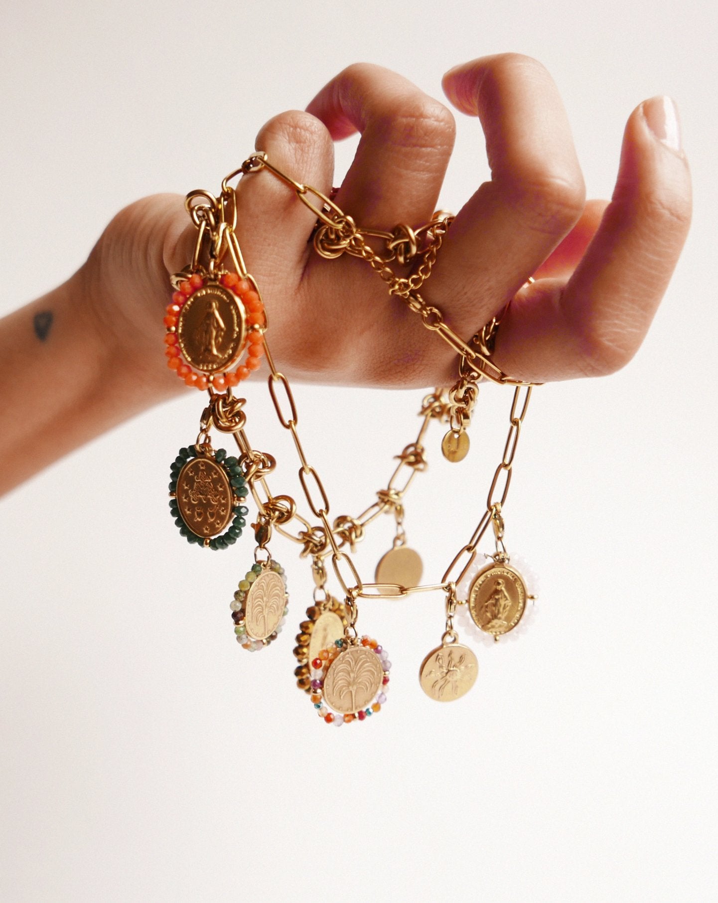 Golden dangle charms with semi-precious stones – Palas
